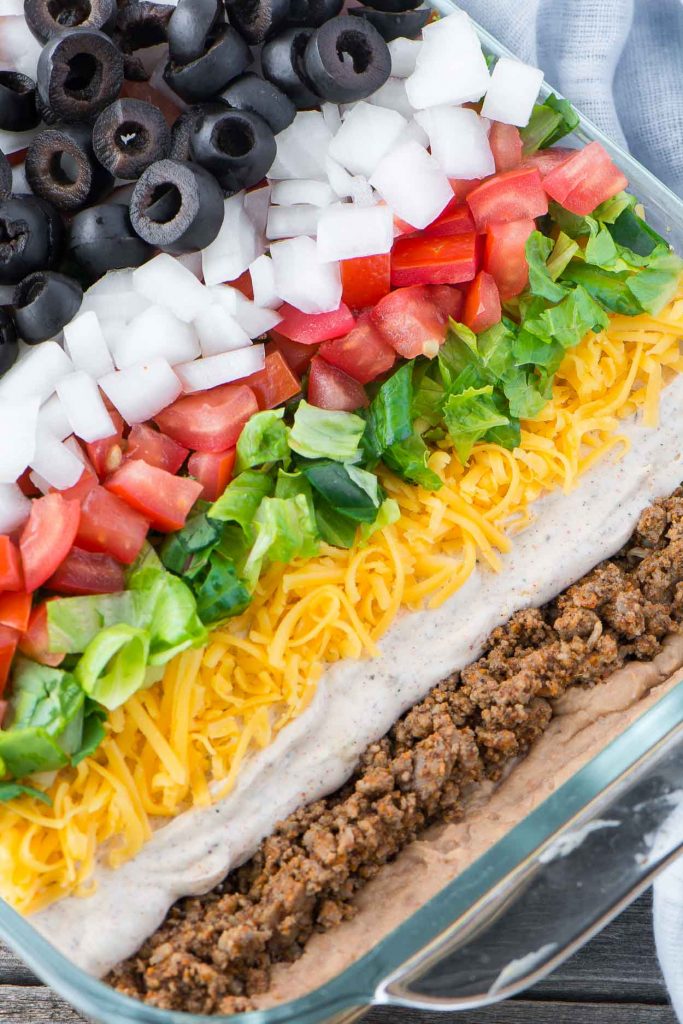 5 Layer Mexican Dip & Chips - Kelli's Catering & Events
